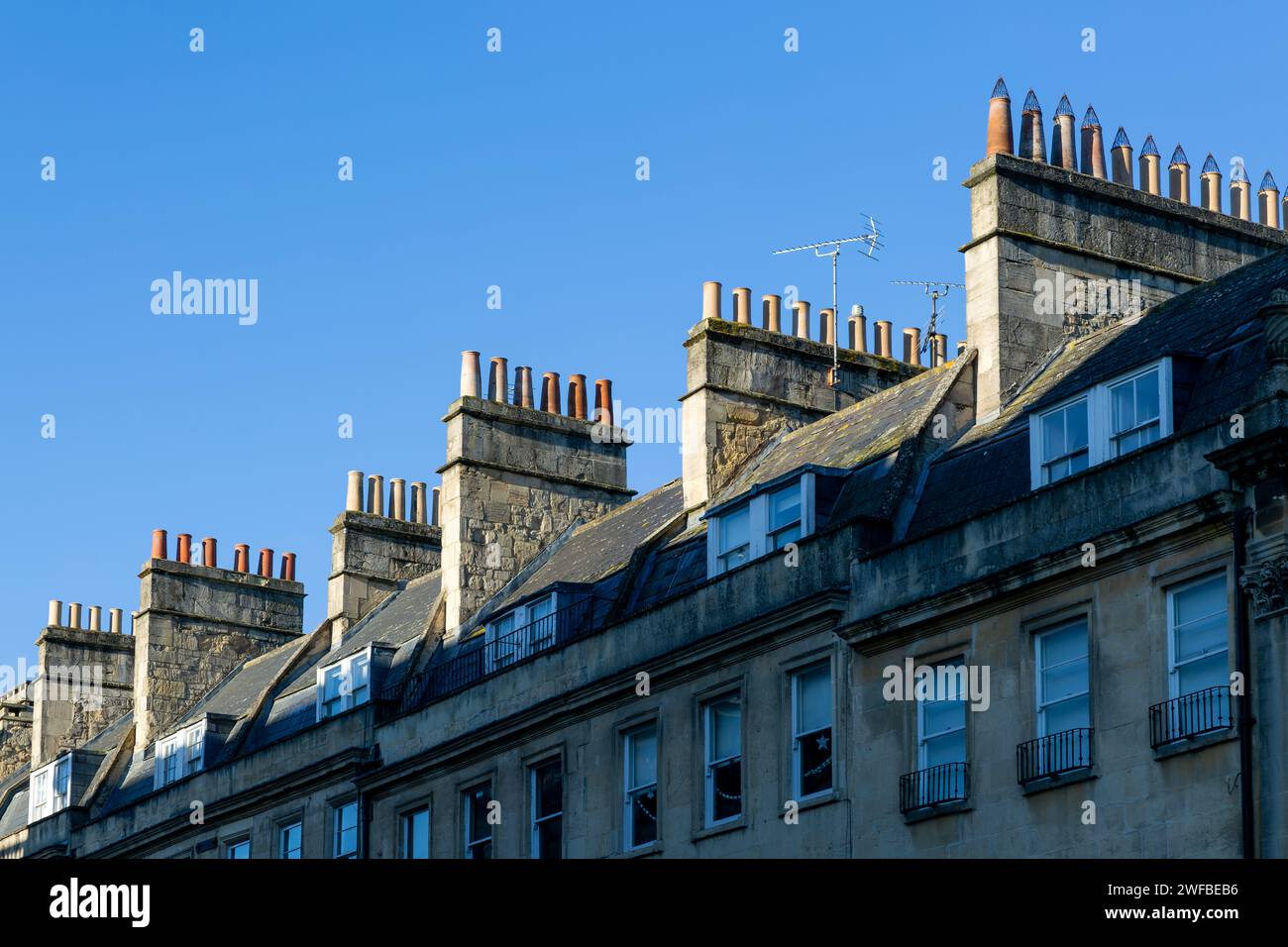 Chimney pots on roof of Georgian houses, Bridge Street, Bath, Somerset ...