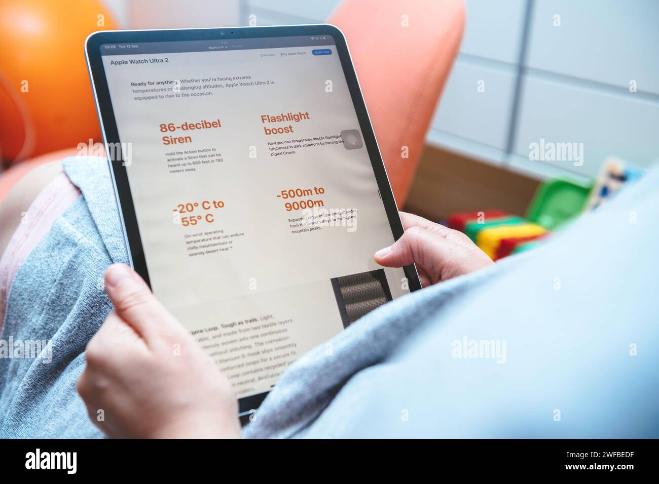 London, UK - Sep 13, 2023: A woman is intrigued by the 86-decibel siren ...