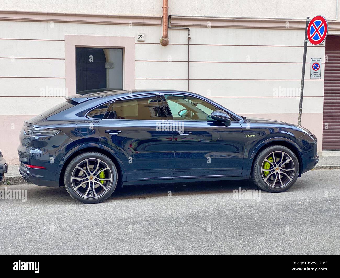Castell'Arquato, Italy - June 25 2023 Porsche Macan expensive hybrid ...