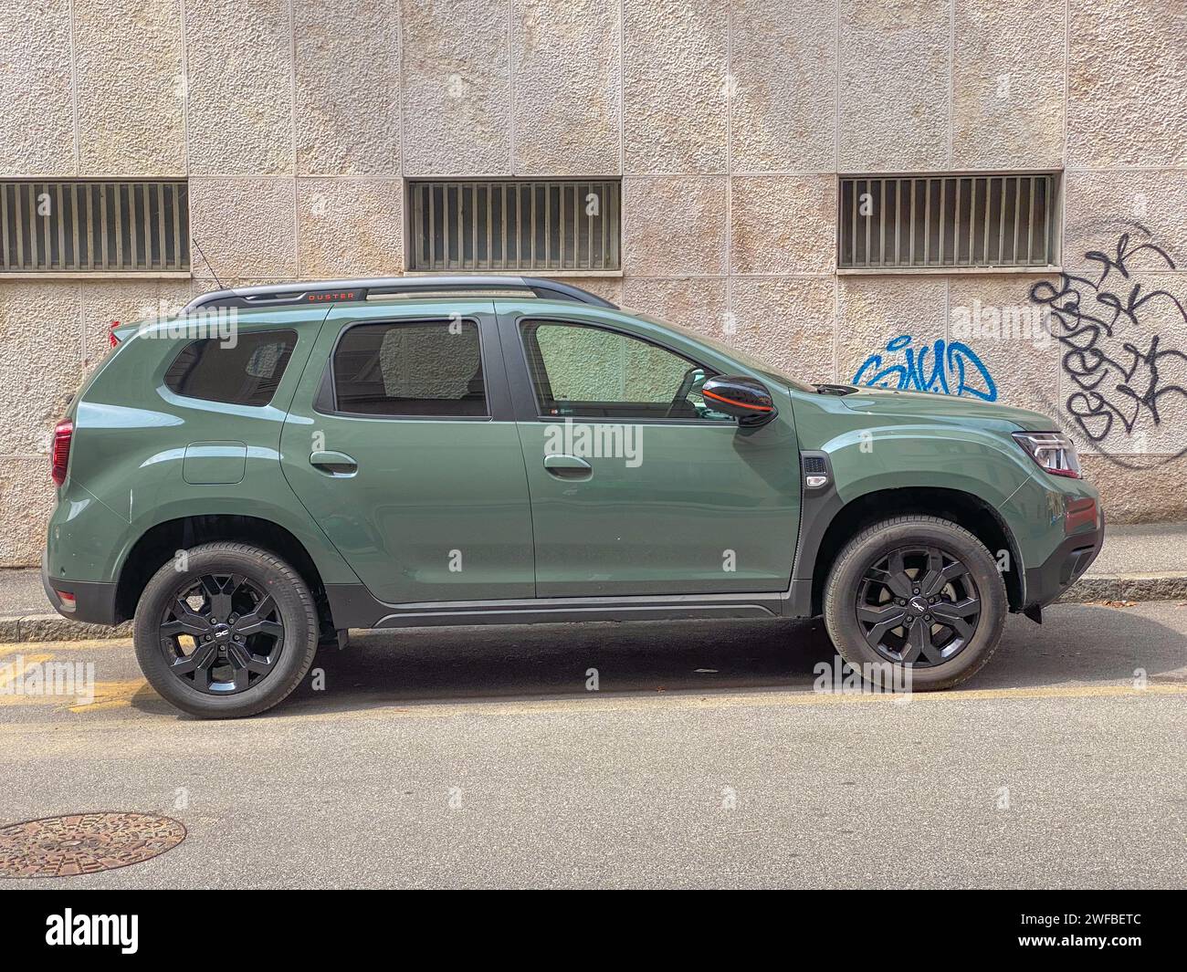 Castell'Arquato, Italy - June 25 2023 Jeep Dacia Duster in matte green ...