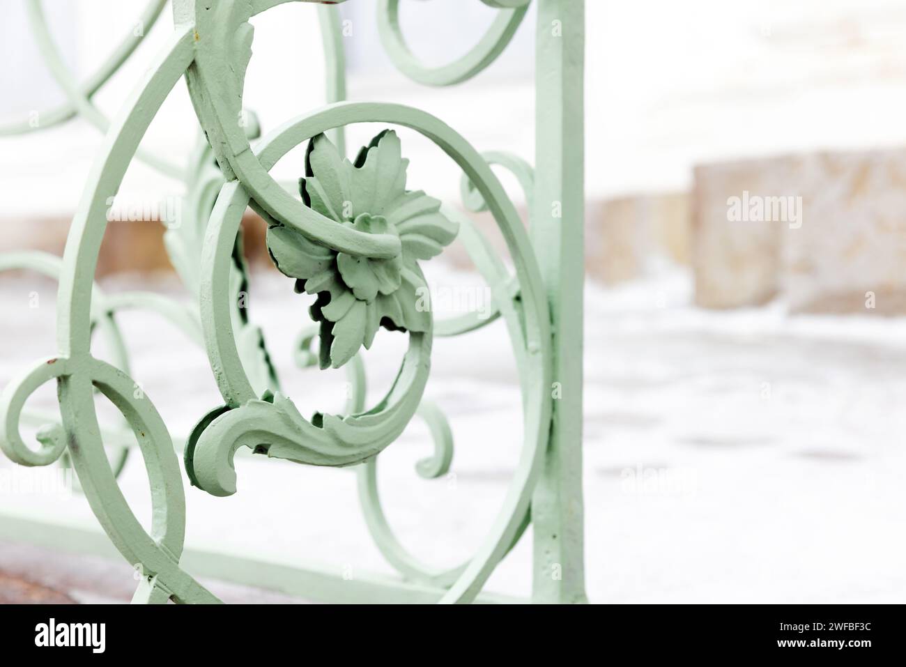 Vintage green forged railings with floral decoration design elements ...