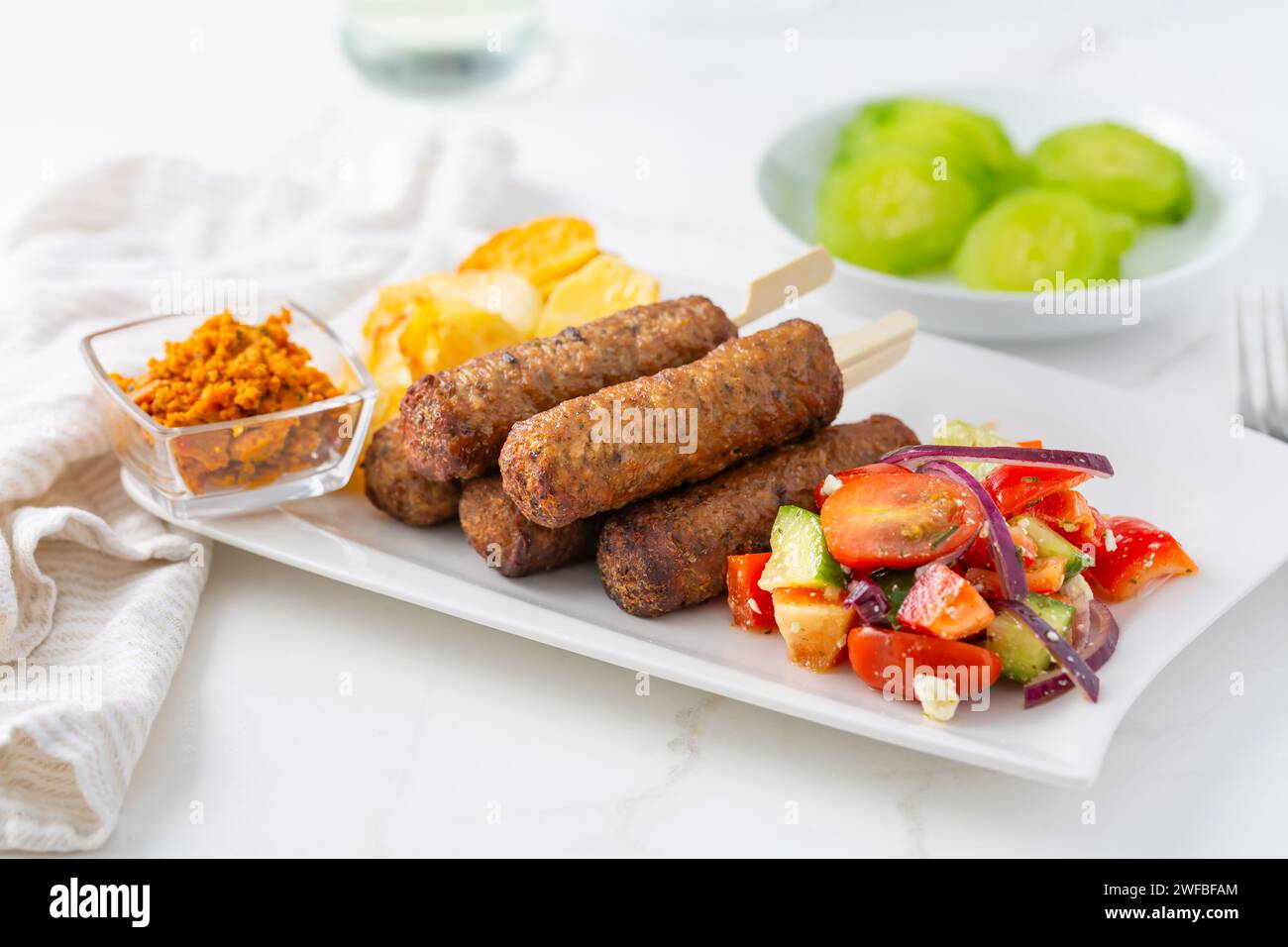 Traditional south european skinless sausages cevapcici made of ground ...
