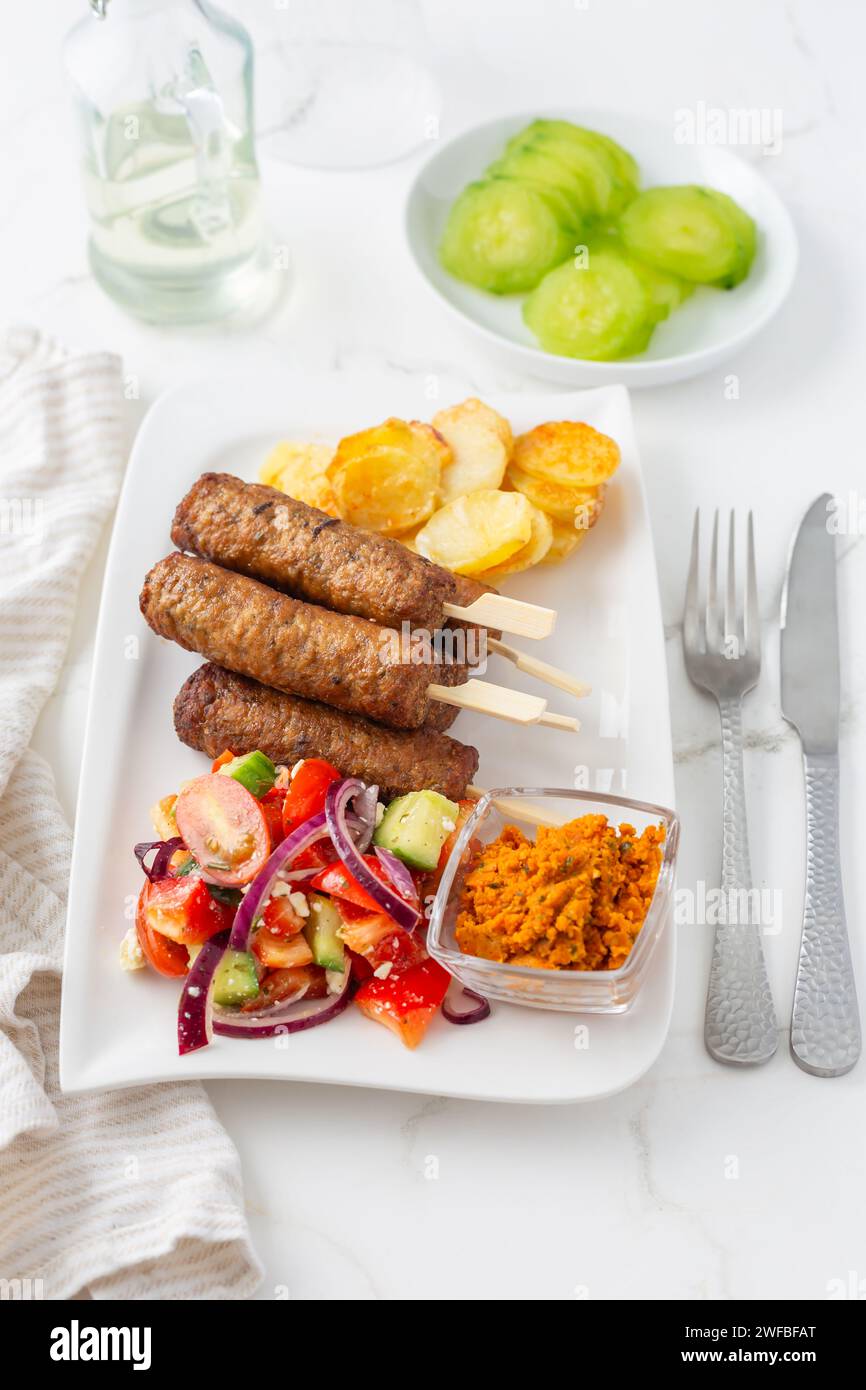 Traditional south european skinless sausages cevapcici made of ground ...