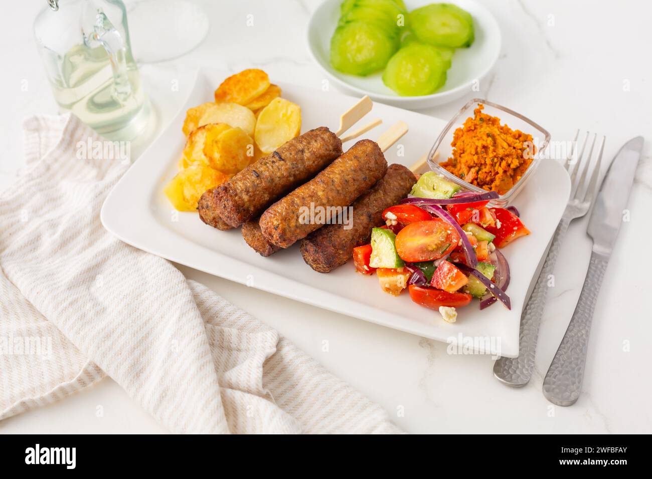 Traditional south european skinless sausages cevapcici made of ground ...
