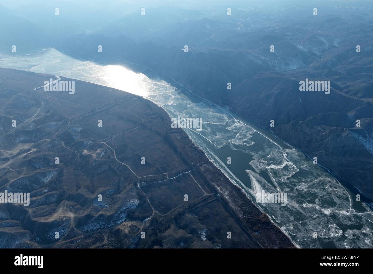 Aerial photo shows the frozen Yellow River in Qingtongxia City ...