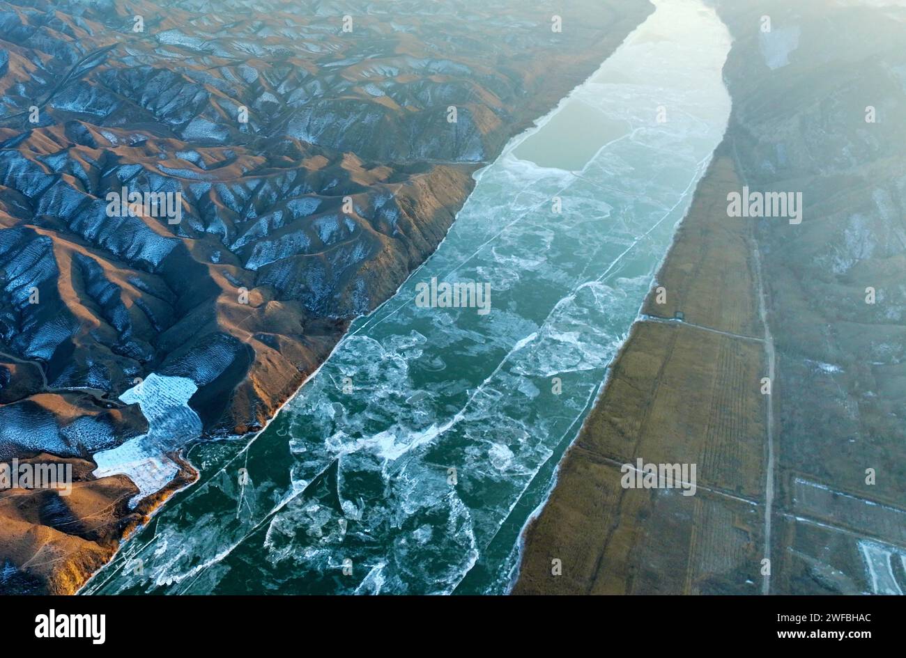 Aerial photo shows the frozen Yellow River in Qingtongxia City ...