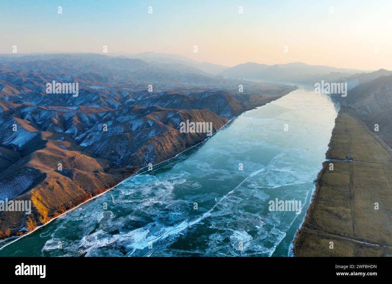 Aerial photo shows the frozen Yellow River in Qingtongxia City ...