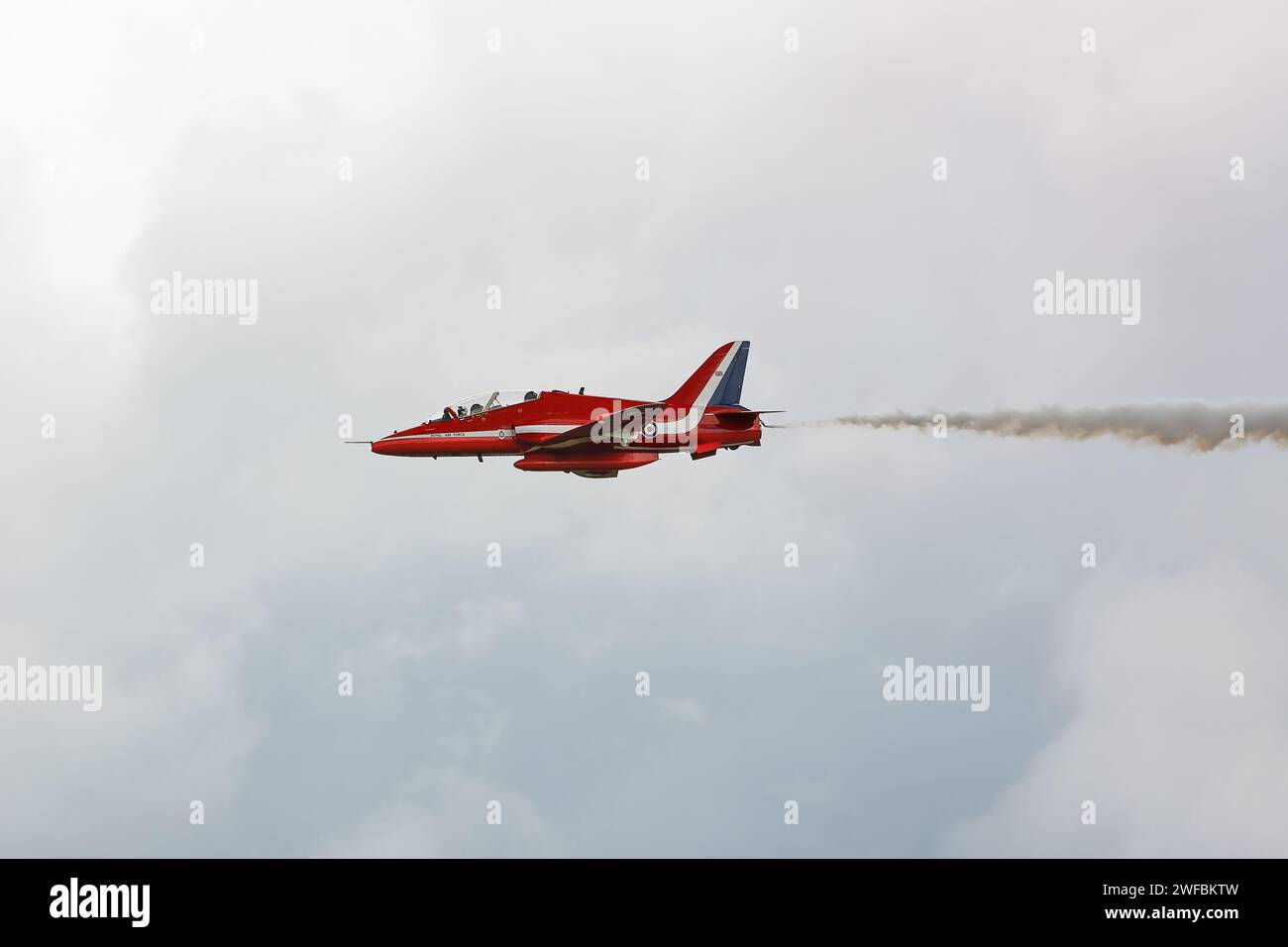 A Royal Airforce Red Arrows Hawk T1 jet aircraft performs a flypast during a aerobatic air ...