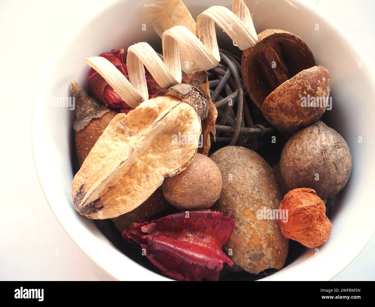 A pot-pourri arrangement derived from dried naturally fragrant plant ...