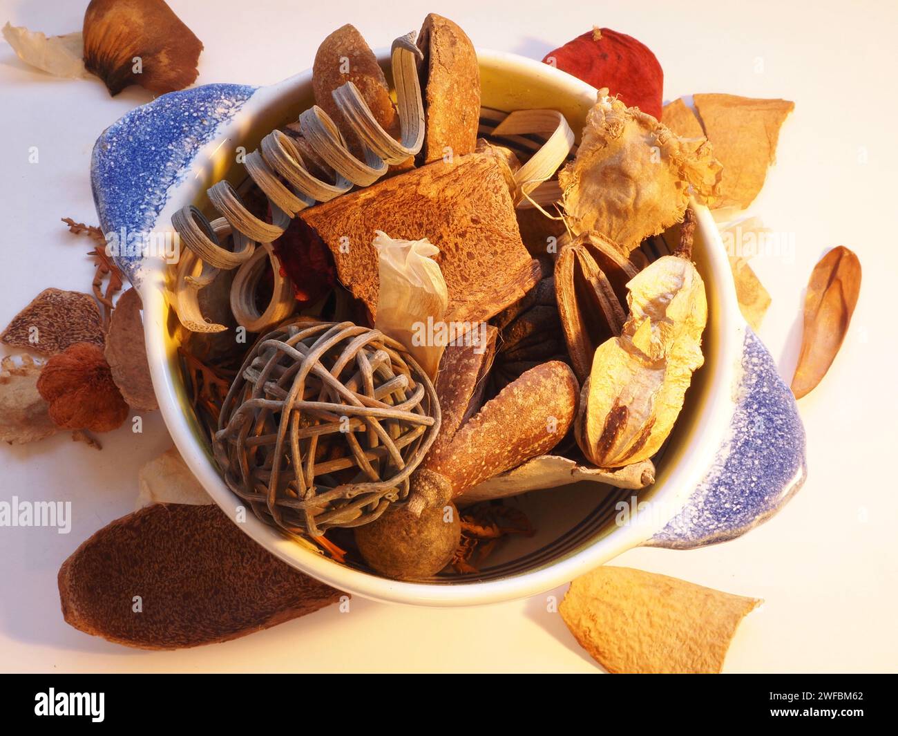 A pot-pourri arrangement derived from dried naturally fragrant plant ...