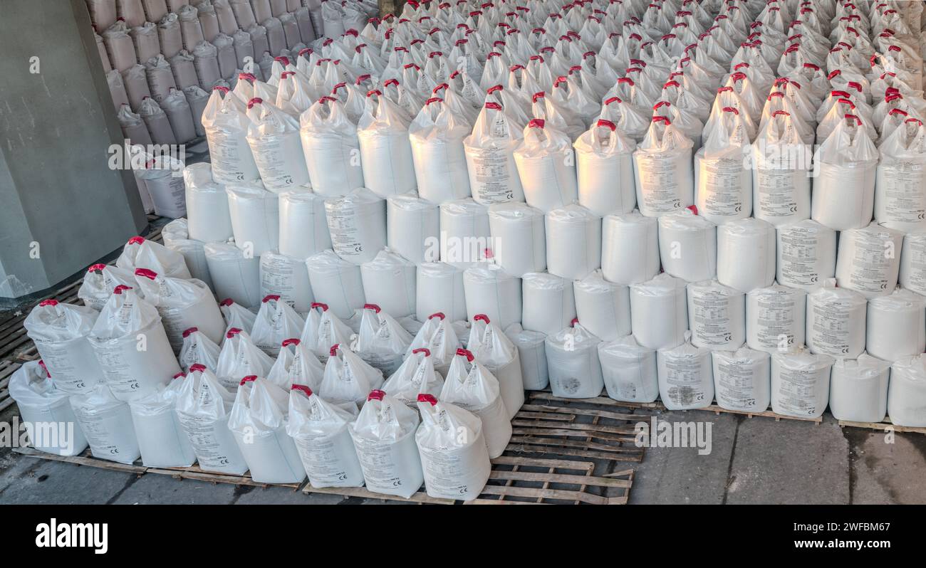 Stack of fertiliser bags in storage Stock Photo - Alamy