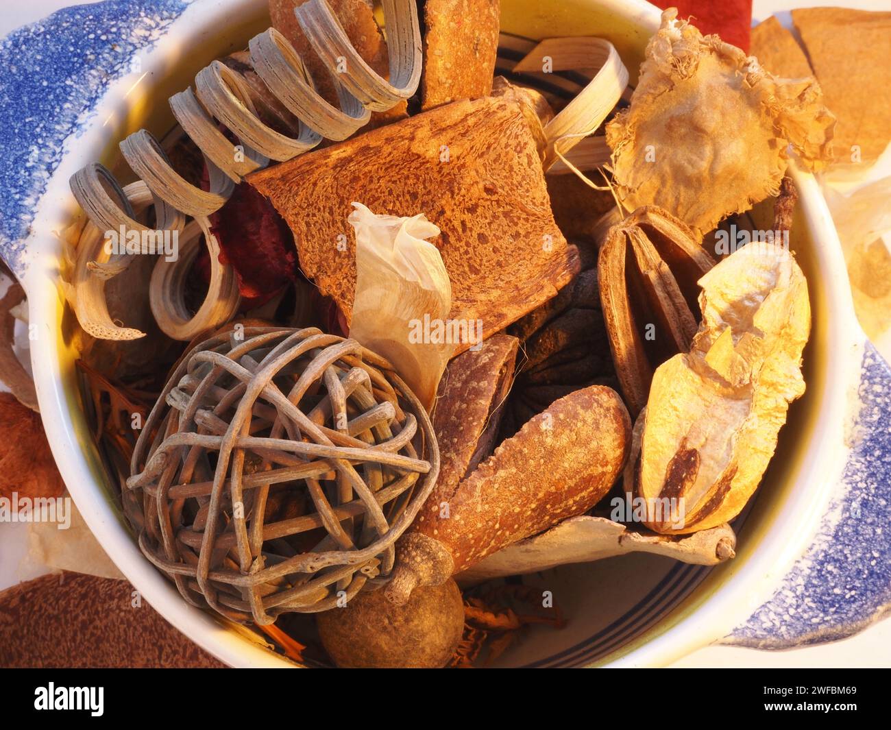 A pot-pourri arrangement, the content derived from dried naturally ...