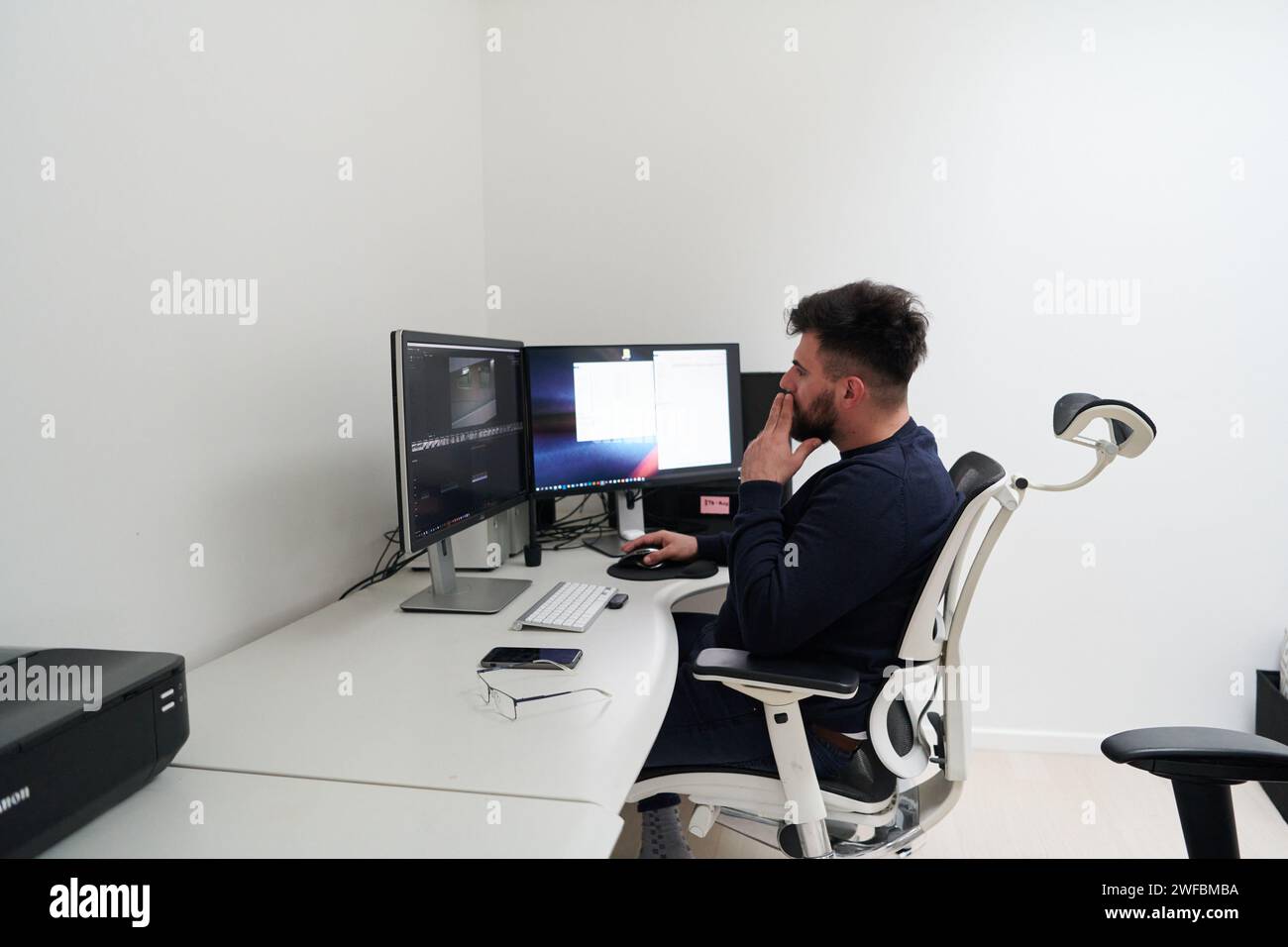 professional video editor enhancing digital footage using specialized ...