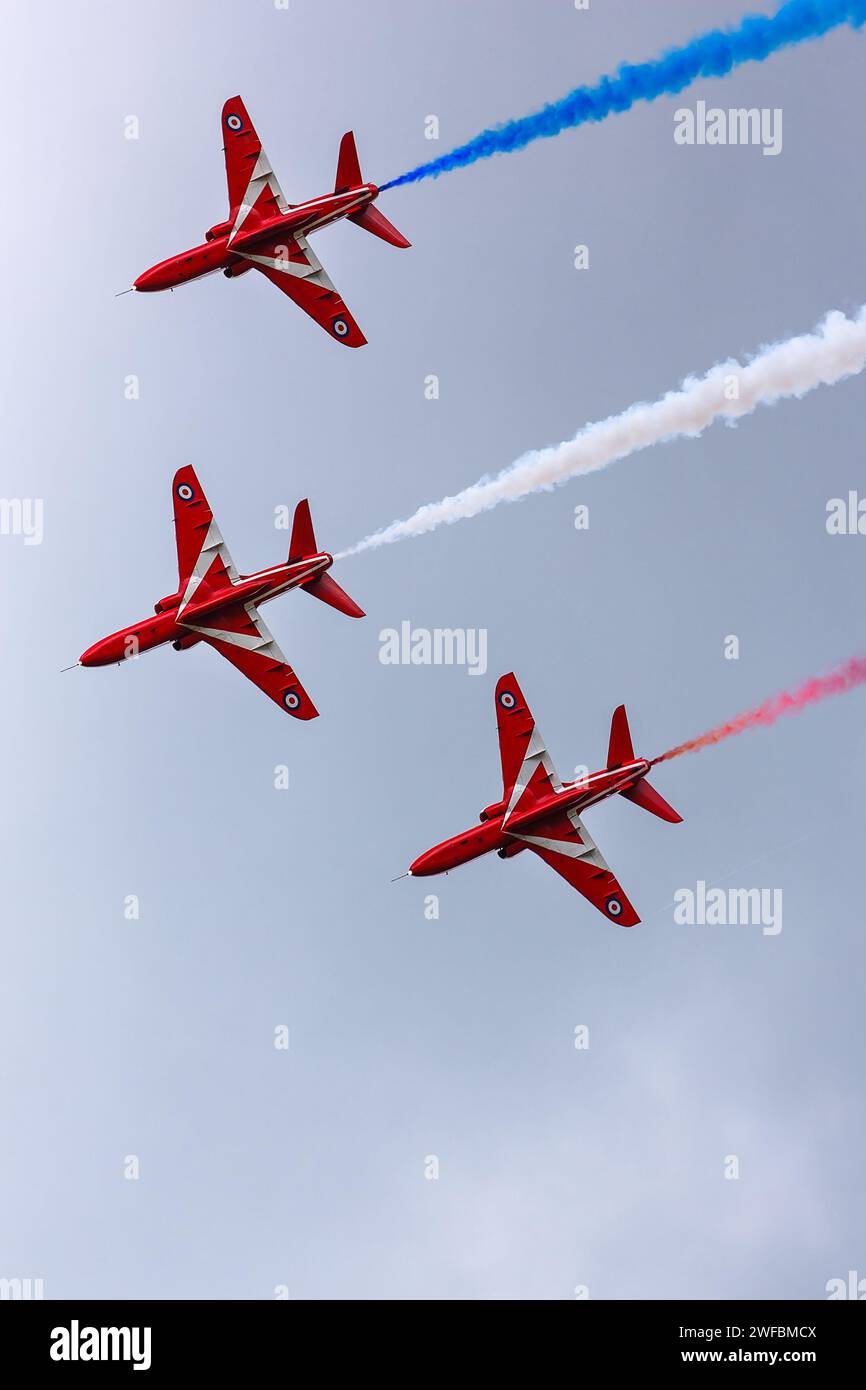 Royal Airforce Red Arrows Hawk T1 jet aircraft perform a flypast during ...