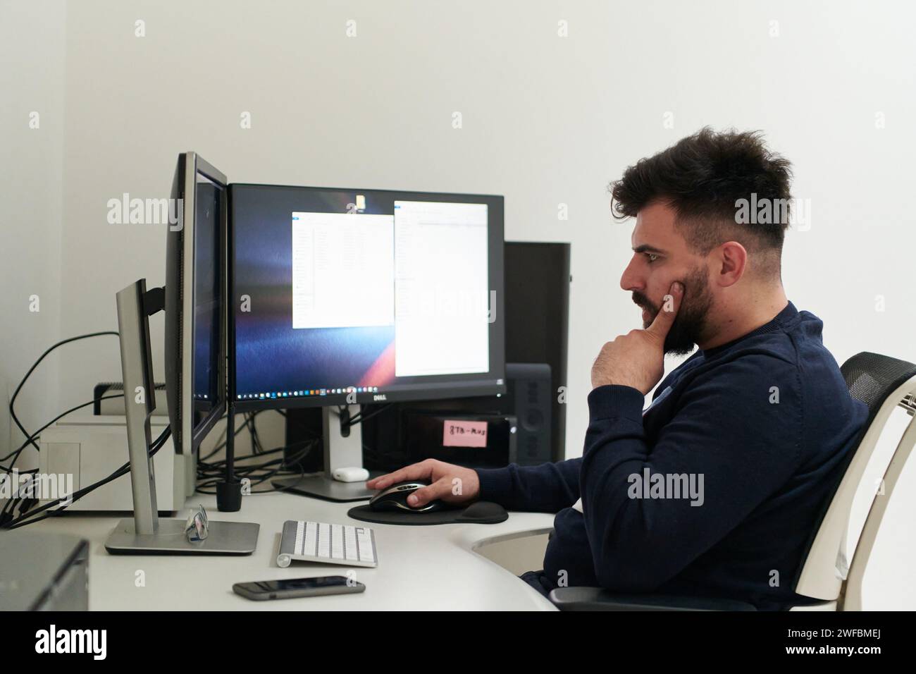 professional video editor enhancing digital footage using specialized ...