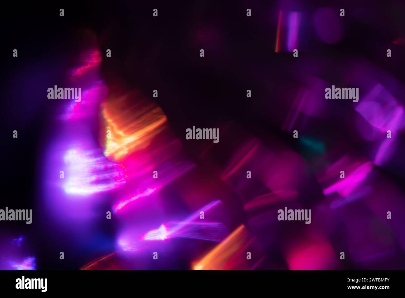 Abstract blurred colorful lens flare bokeh on black Stock Photo - Alamy