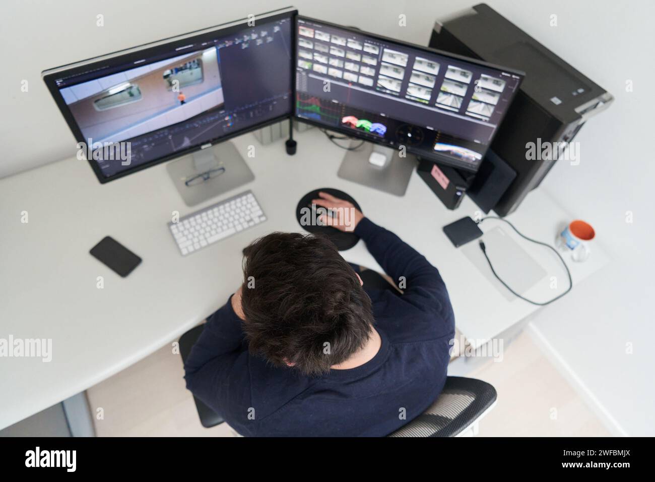 professional video editor enhancing digital footage using specialized ...