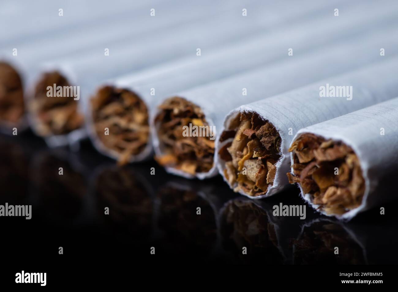 cigarette, cigarette on black background, pack of cigarettes, close-up ...