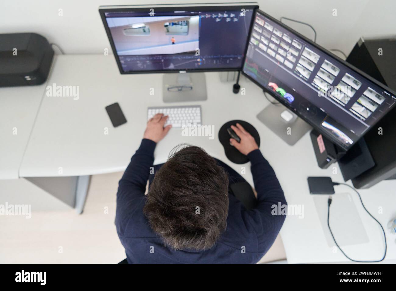 professional video editor enhancing digital footage using specialized ...