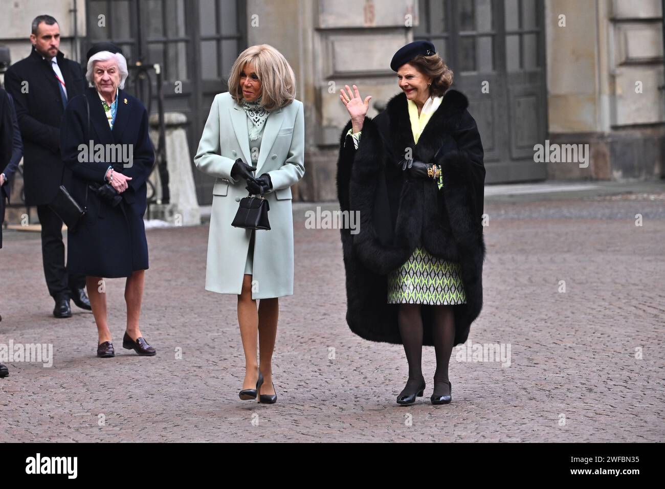 Mrs. Brigitte Macron and Queen Silvia during a welcome ceremony at the ...