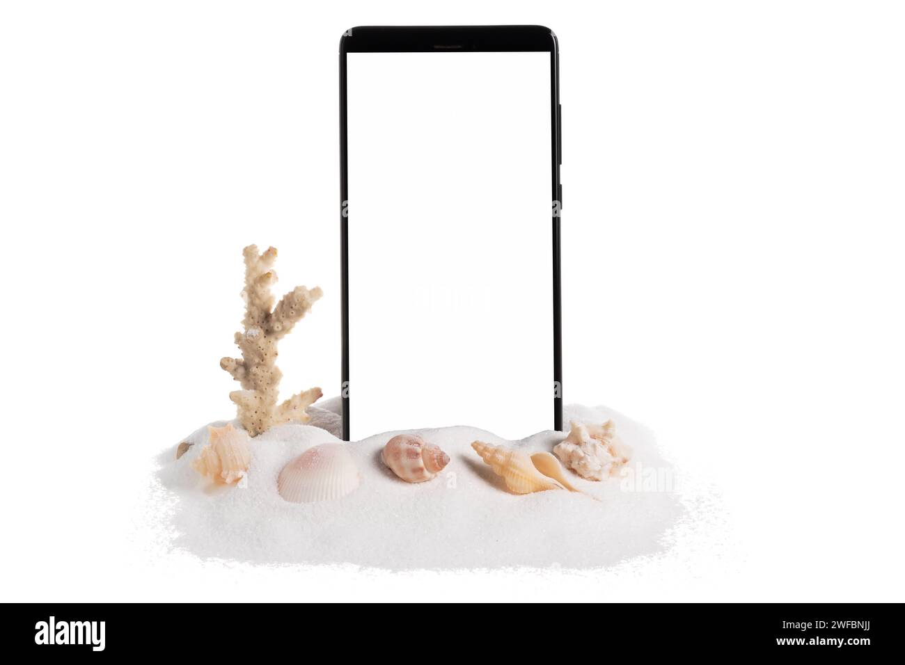 Smartphone with empty screen in sand and shells on white background ...