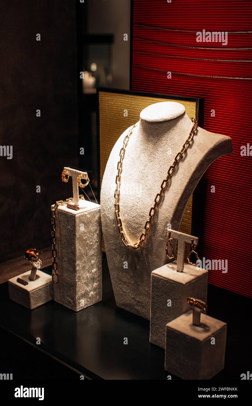 Earrings on a metal stand hi-res stock photography and images - Alamy