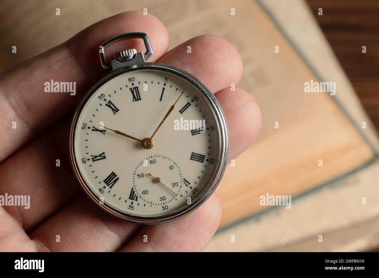 pocket watch in the hands of a man Stock Photo - Alamy