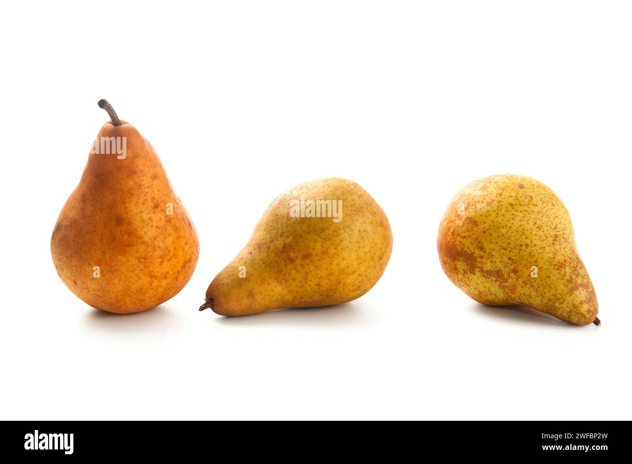 Three ripe juicy pear fruits with soft shadow isolated on white ...