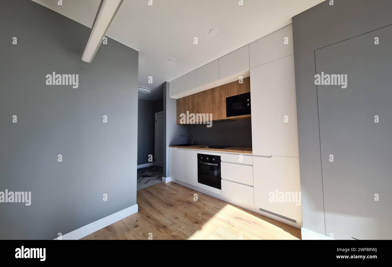 Kitchen interior in small apartment, ceiling repair Stock Photo - Alamy