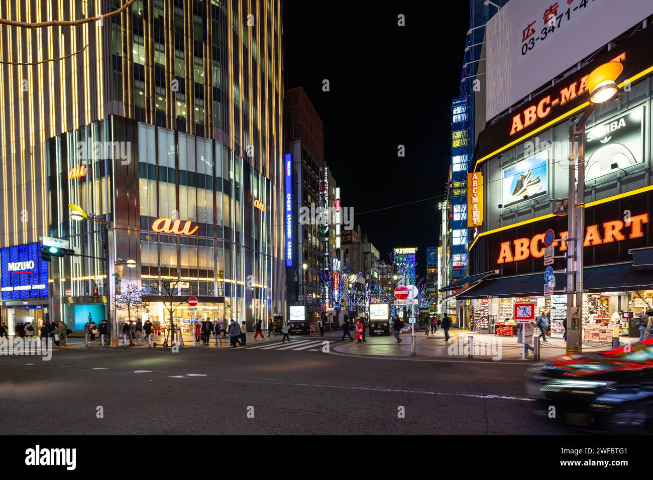 Tokyo, Japan. January 9, 2024. night view of people walking among the ...