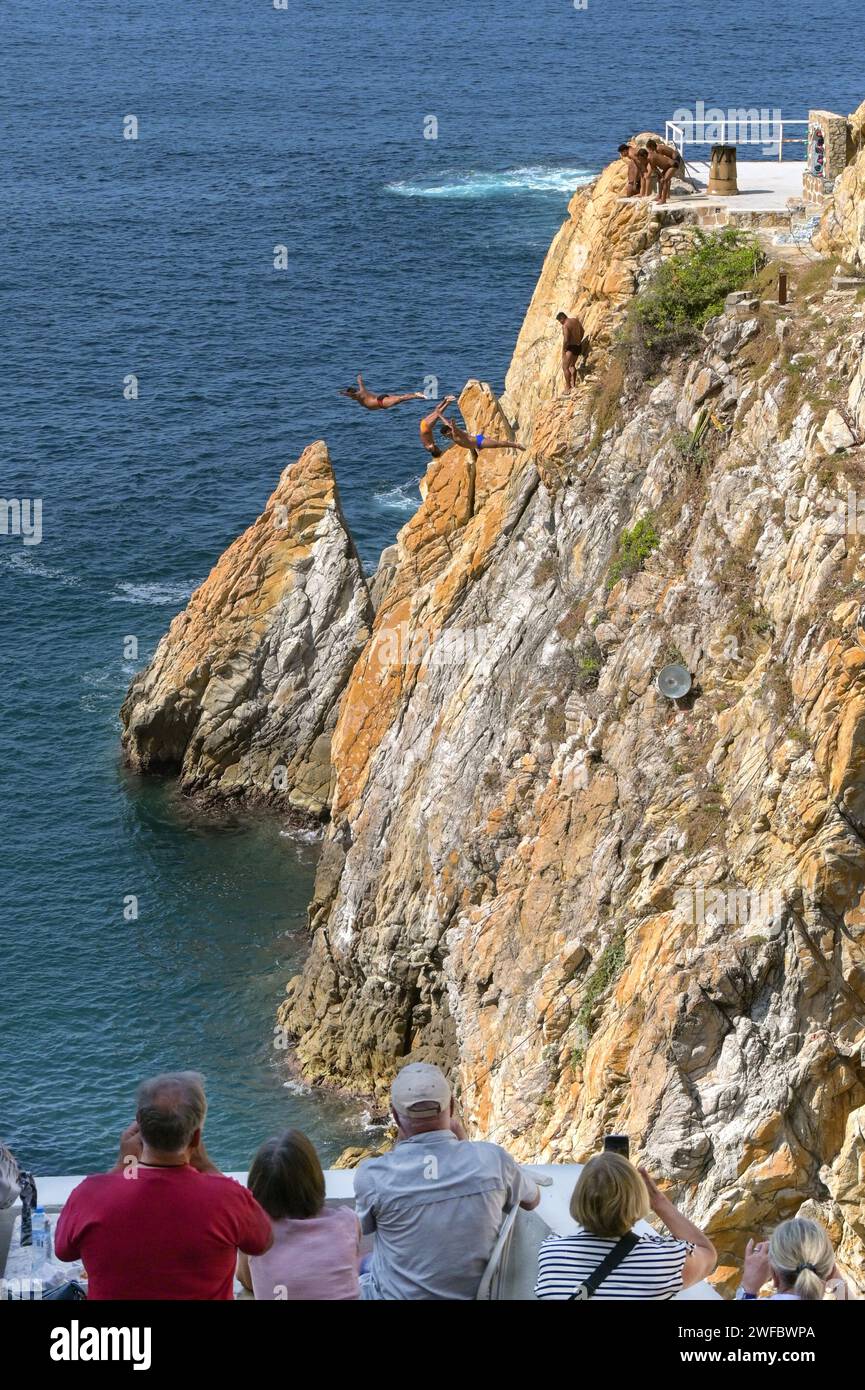 Acapulco, Mexico - 17 January 2024: Tourists watch as the famous cliff ...