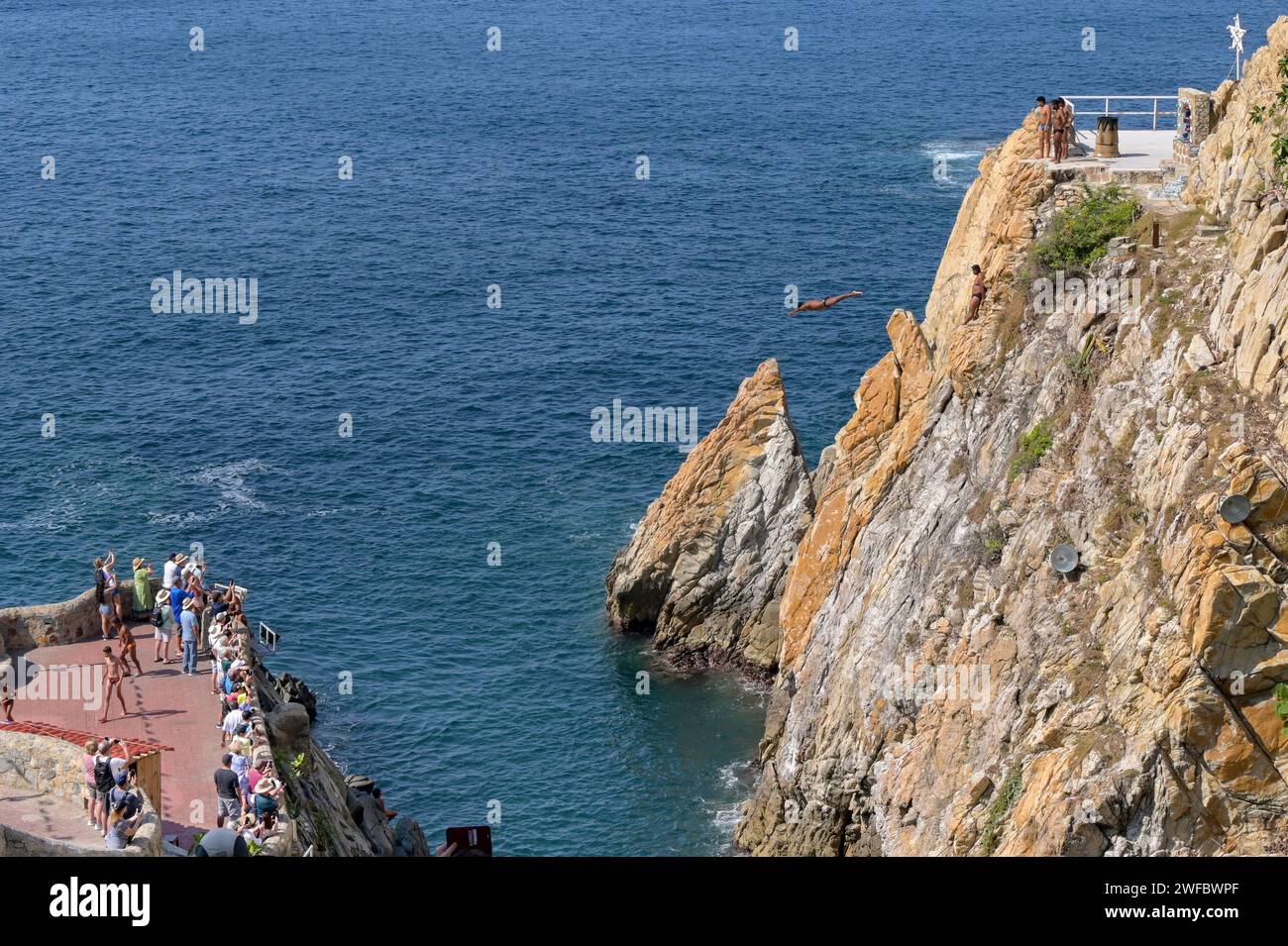 Acapulco, Mexico - 17 January 2024: Tourists watch as the famous cliff ...