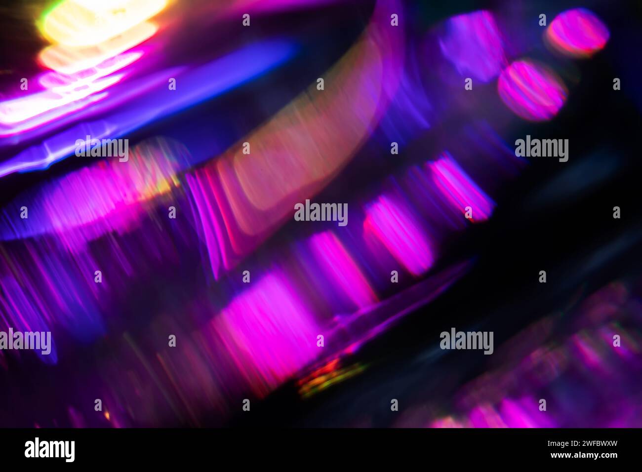 Abstract blurred colorful lens flare bokeh on black Stock Photo - Alamy