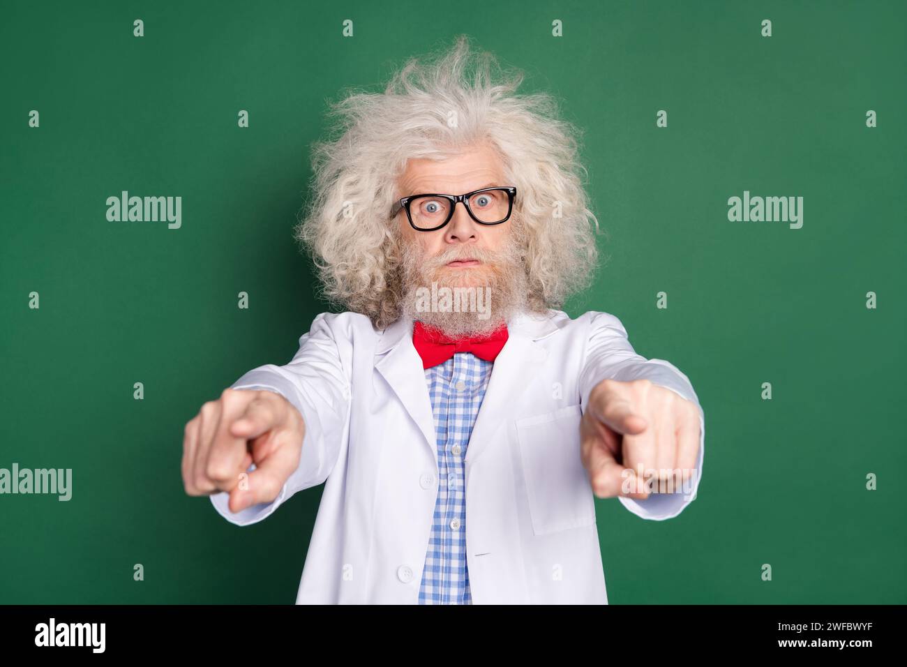 Photo of serious crazy funky funny scientist in glasses with messy hair ...