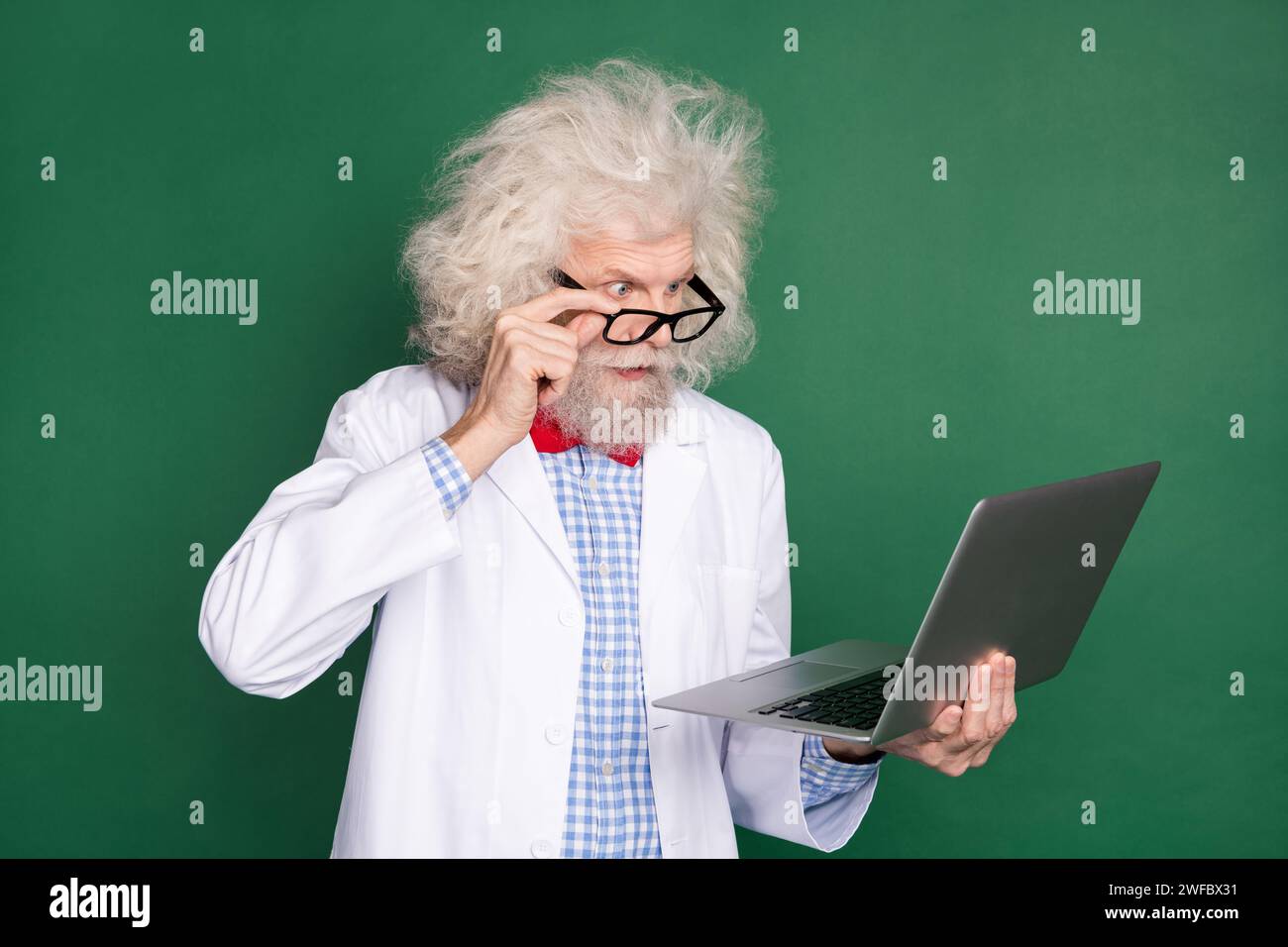 Photo of funny impressed age scientist wear white coat bowtie arm ...