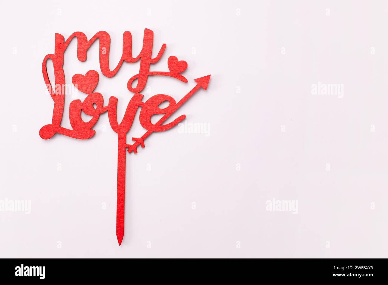The word my love in wooden red letters on white background. Valentine's ...