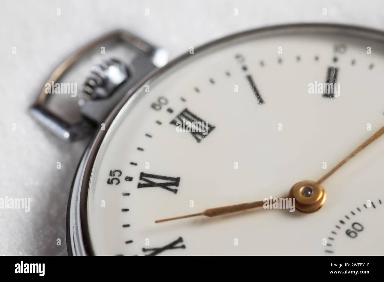 Old beautiful pocket watch lying in the beach sand Stock Photo - Alamy