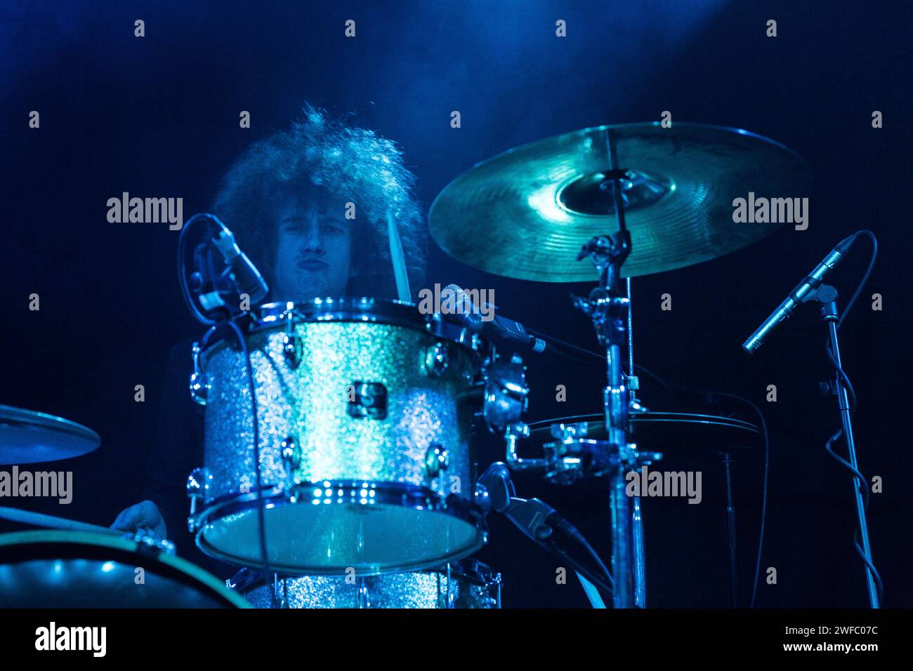 Glass Caves' drummer Elliott Fletcher performing live on stage at ...