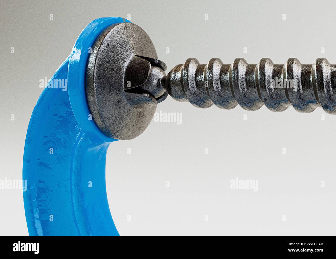 A blue vintage styled G-clamp tool on an isolated white studio ...