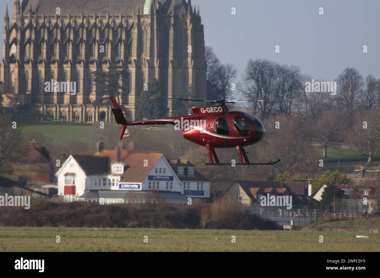 A Hughes 369 helicopter flying at Brighton City Airport Sussex Stock ...