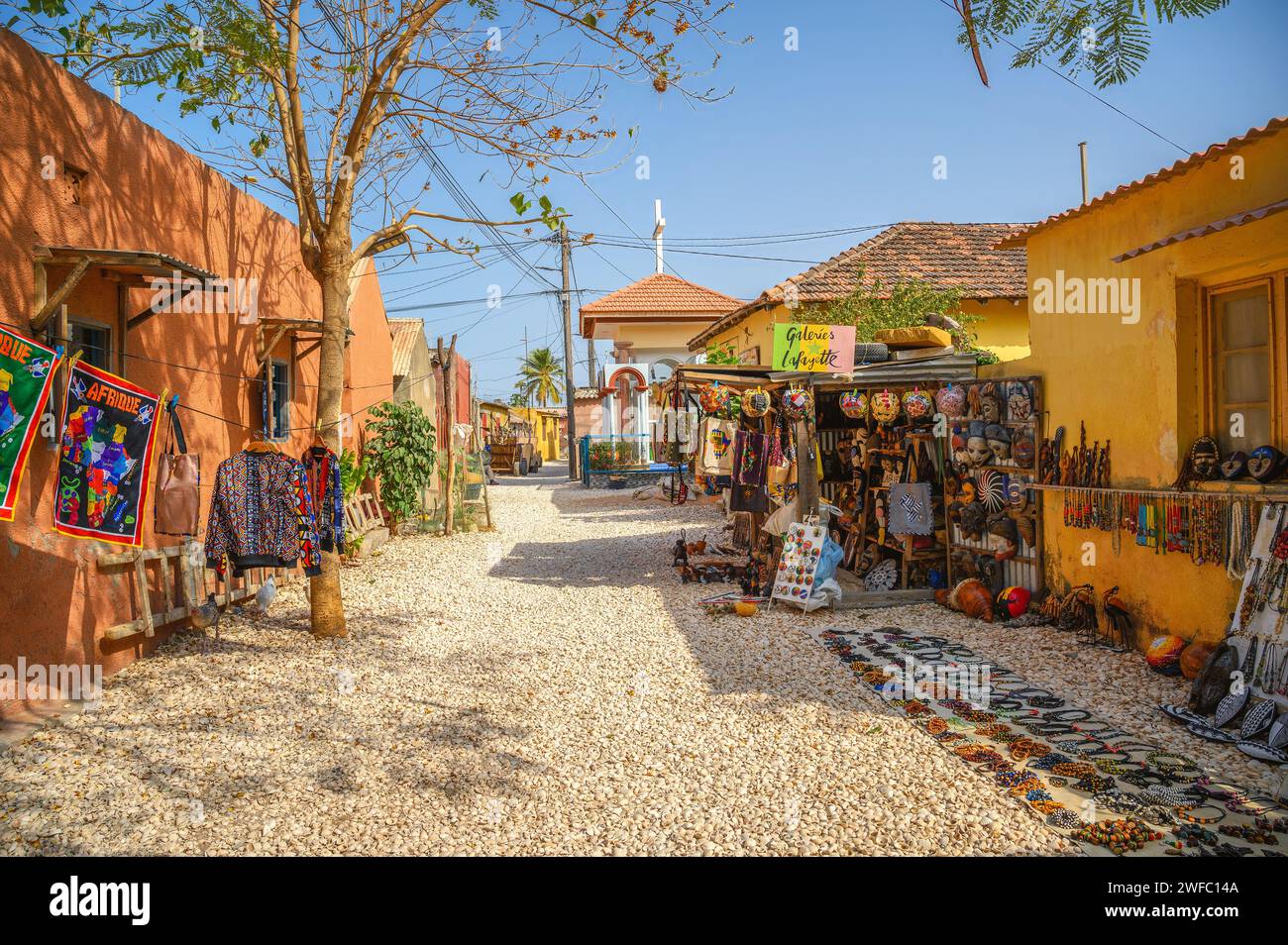 Traditional market street in Joal Fadiouth, Senegal, with artisan ...