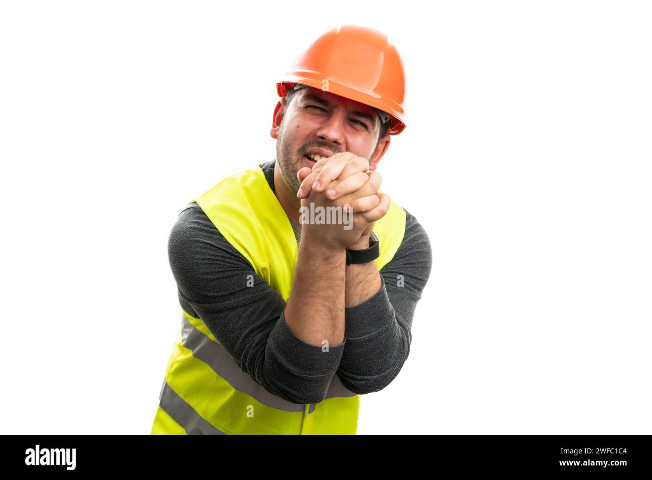 Desperate adult builder man with sad expression begging asking money ...