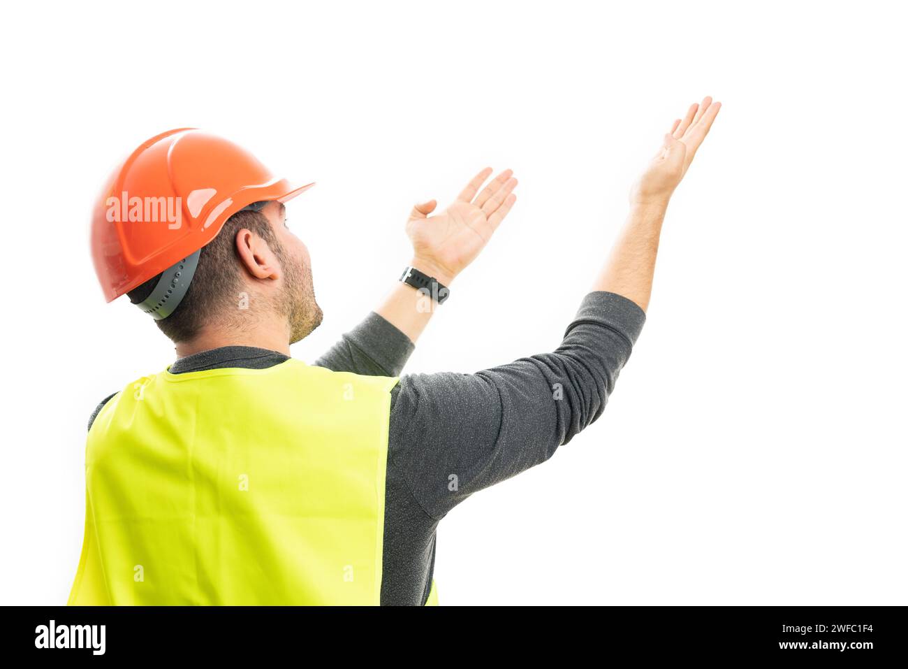Male model as constructor builder man wearing work attire vest and ...