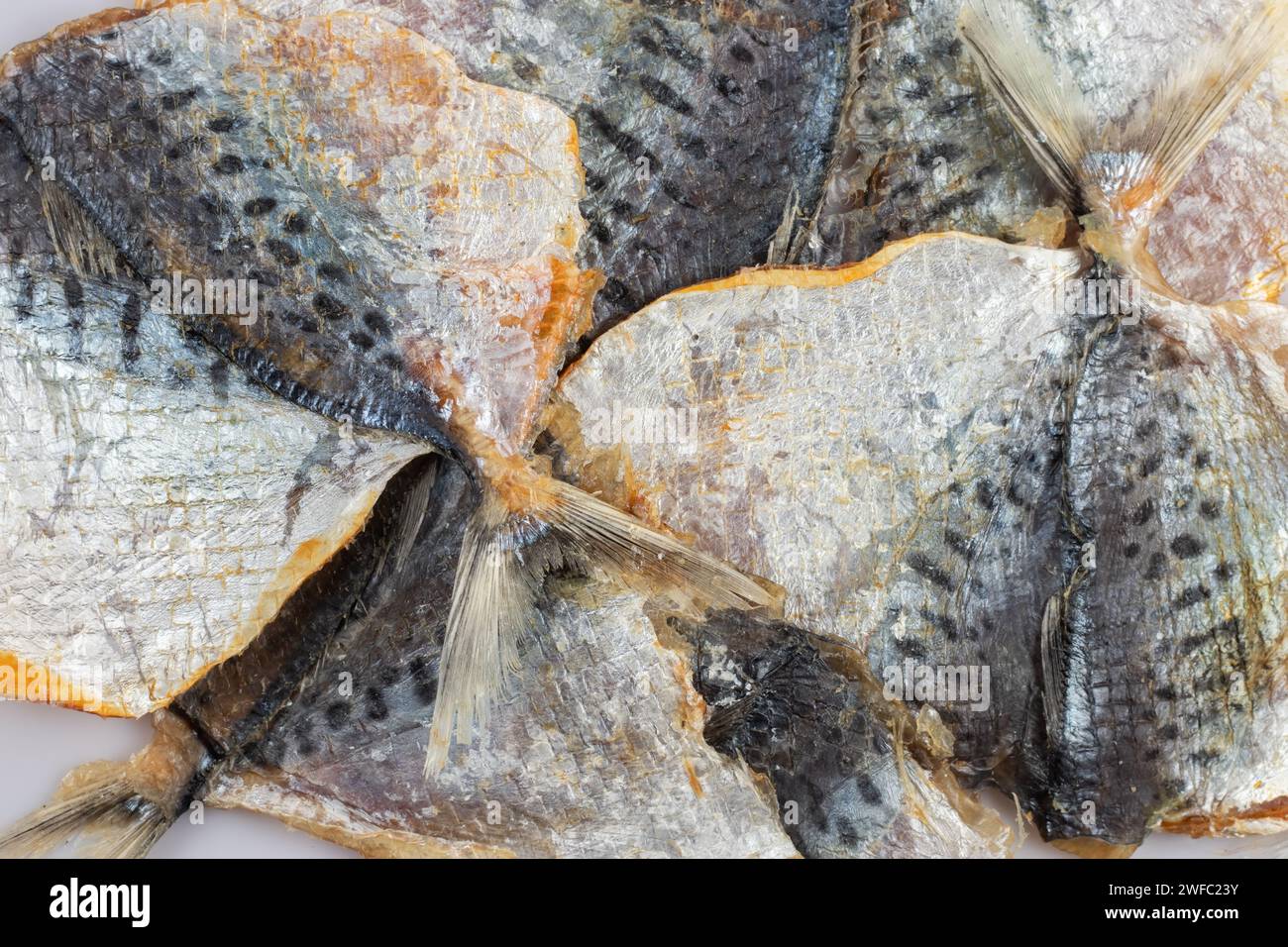Dry salted yellowstripe scad texture background. Dried small fish ...