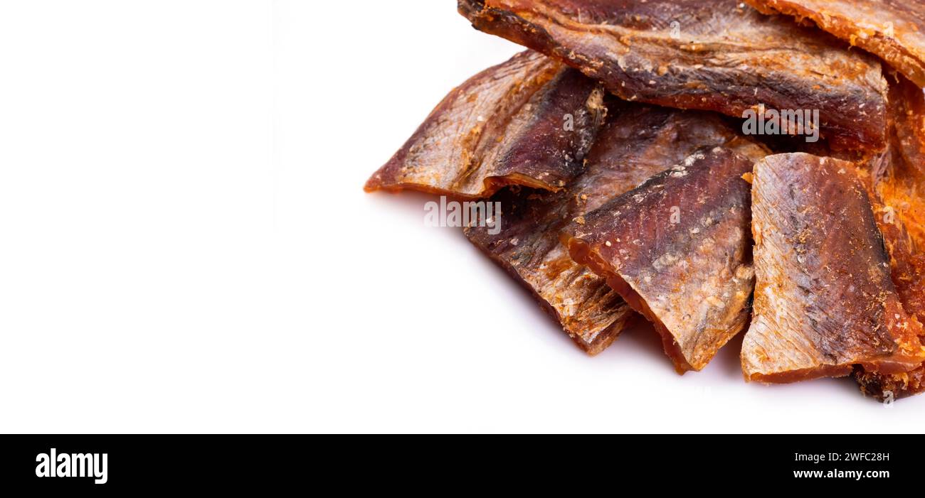 Pieces of cleaned dried fish isolated on white. Dry Peppered Pollack ...