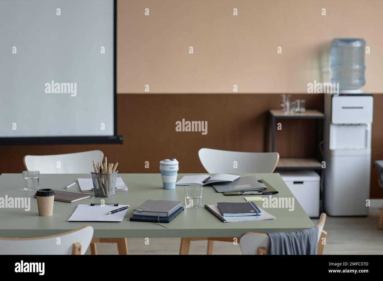 Conference Room with Stationery on Table Stock Photo - Alamy