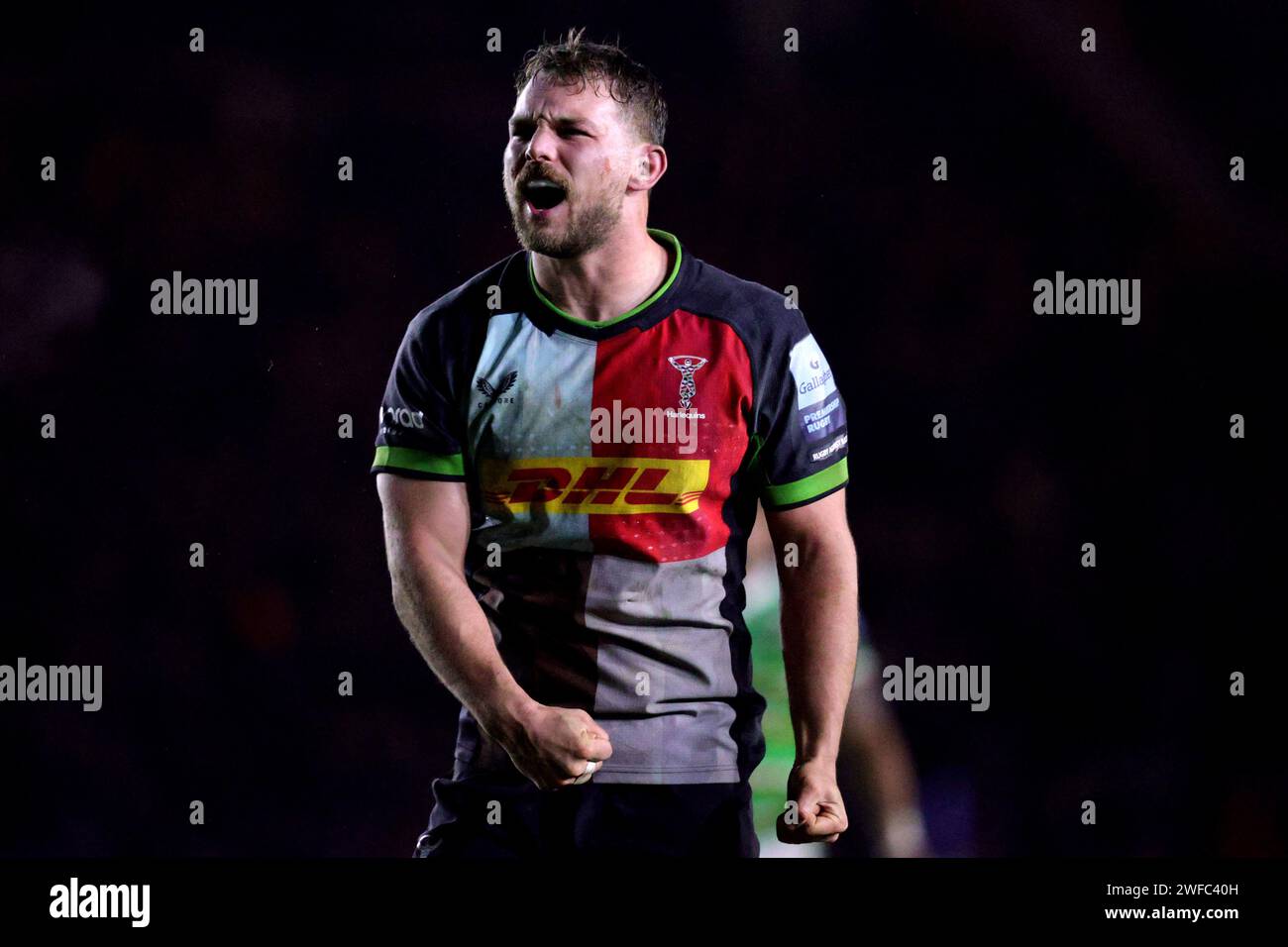 London, UK. 26th January 2024. Harlequin's Will Evans celebrates a ...
