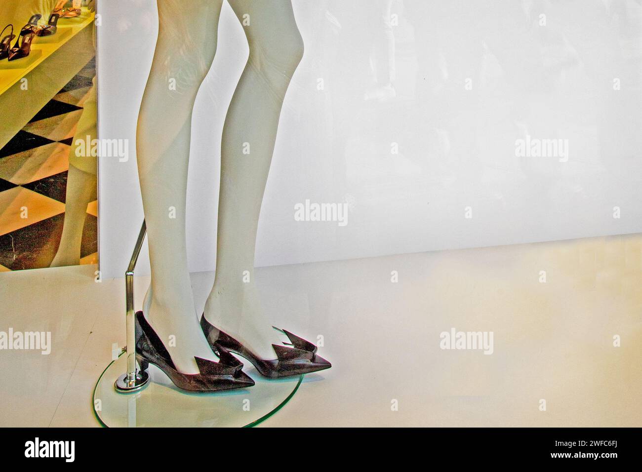 women's black shoes on a mannequin in a fashion store window Stock ...