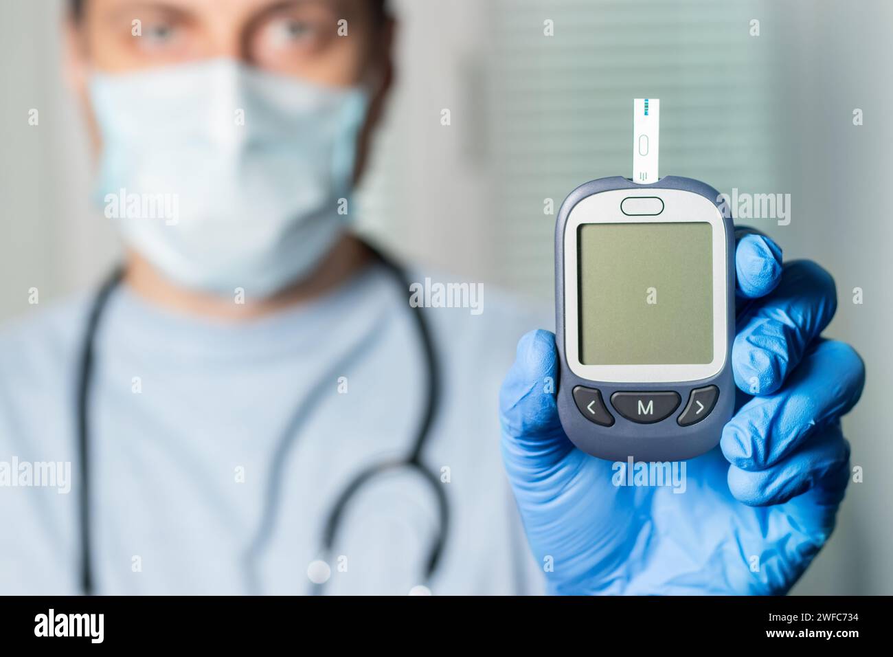 Doctor shows glucometer with glucose level. Doctor and patient diabetes ...