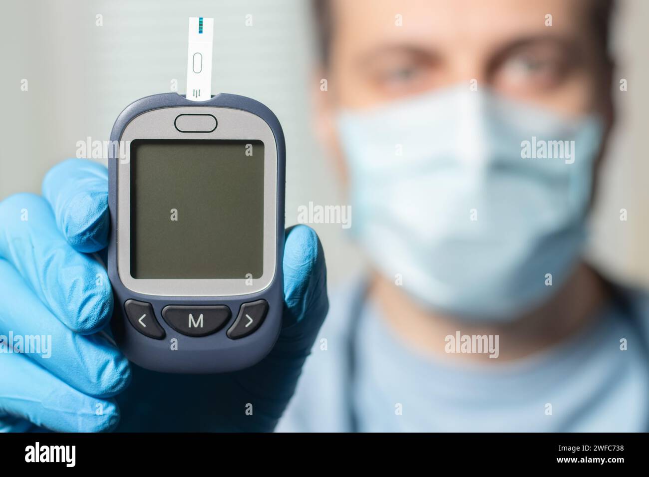 Doctor shows glucometer with glucose level. Doctor and patient diabetes ...